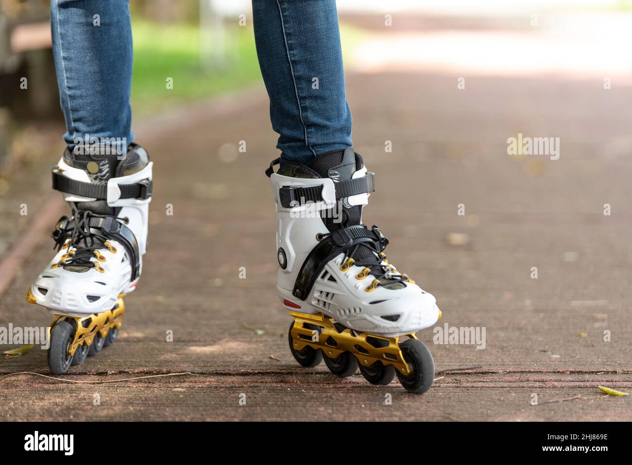 Close-up view of male legs in roller blades Stock Photo - Alamy