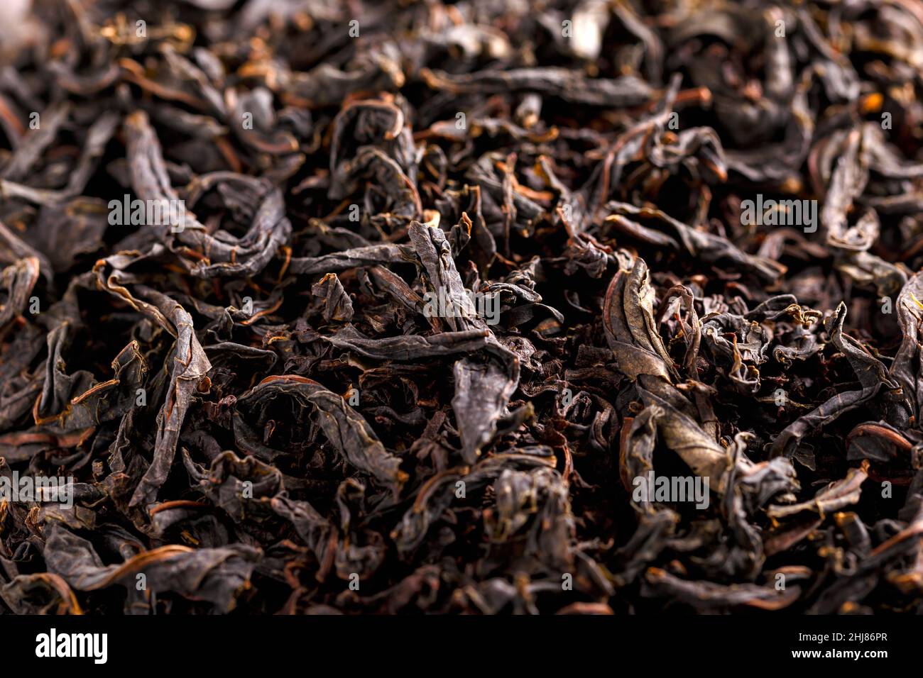 Dry Black large leaf tea. Background, texture Stock Photo - Alamy