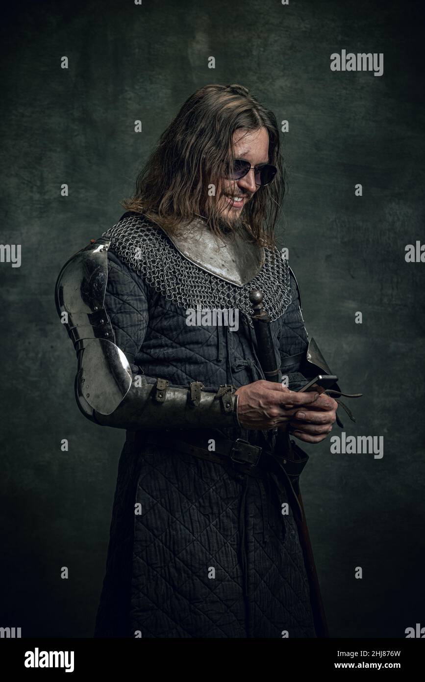 Vintage style portrait of brutal smiling man, medieval warrior or ...