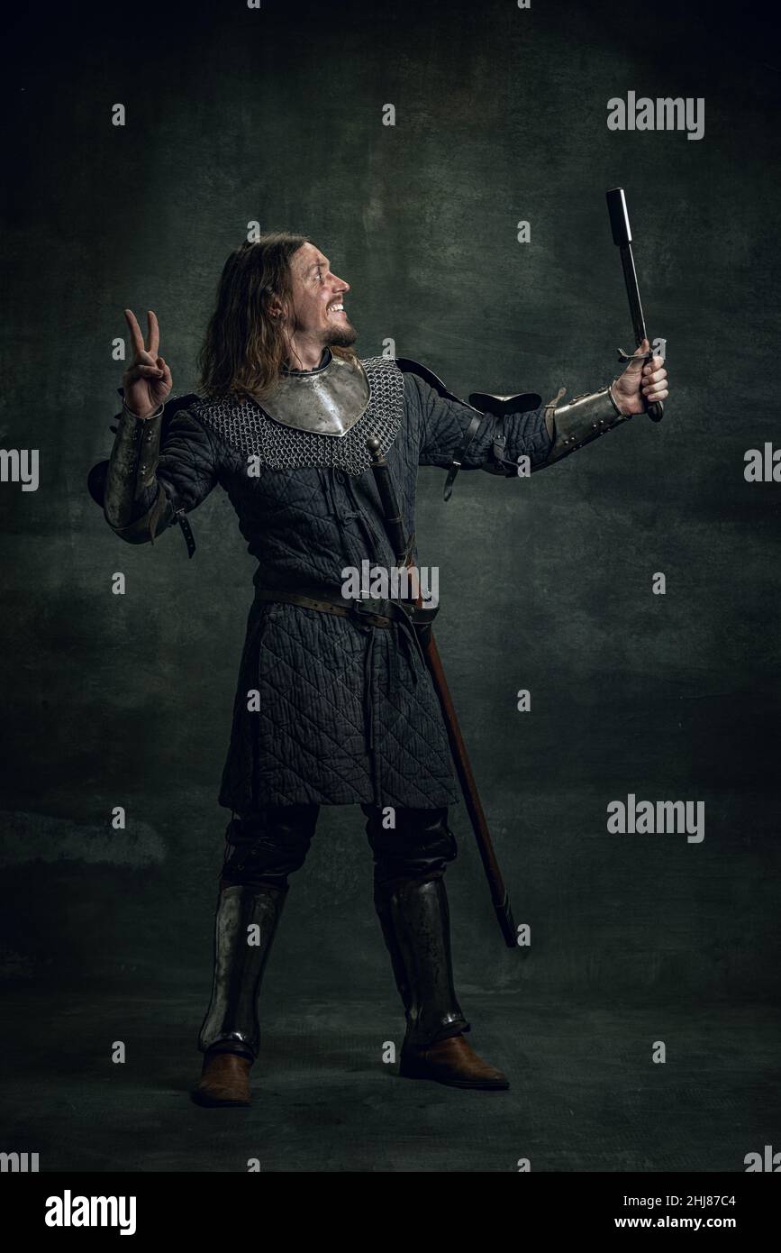 Vintage style portrait of brutal smiling man, medieval warrior or ...