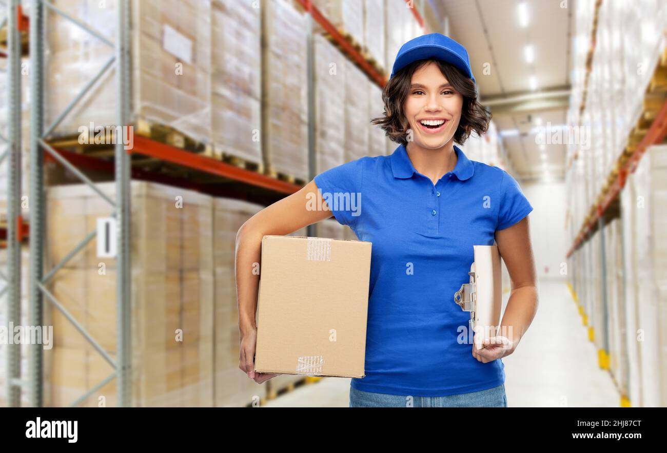 happy delivery girl with parcel box at warehouse Stock Photo - Alamy