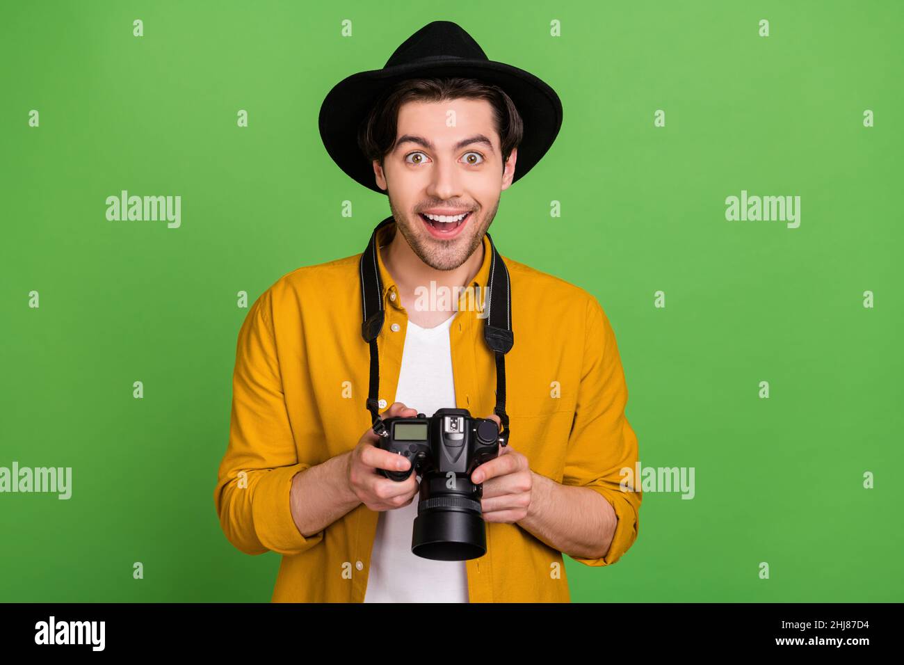 Photo of young happy excited amazed photographer paparazzi catch good ...