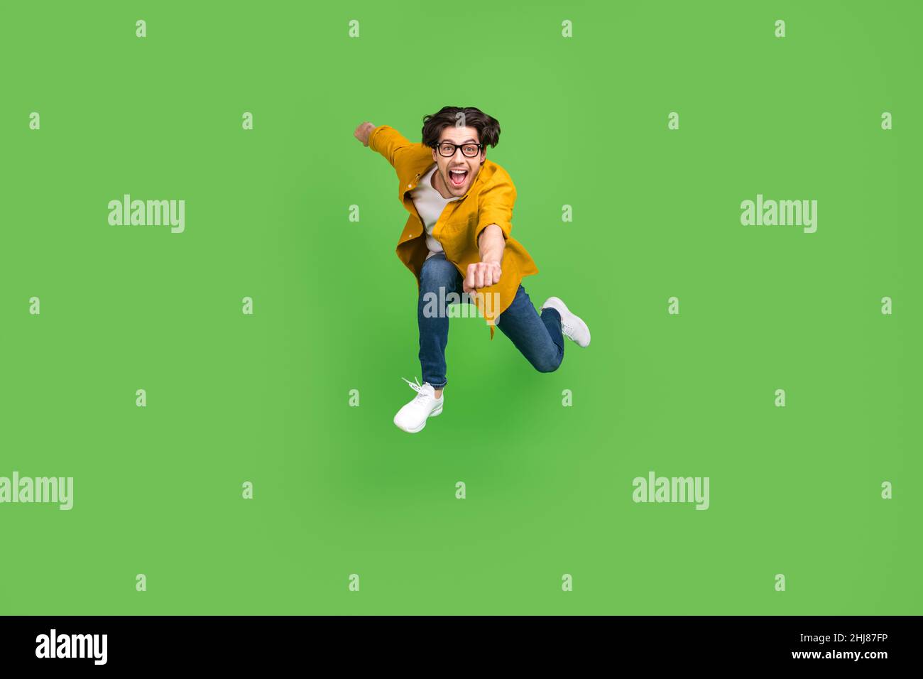 Photo of funny funky young man wear yellow shirt spectacles smiling ...