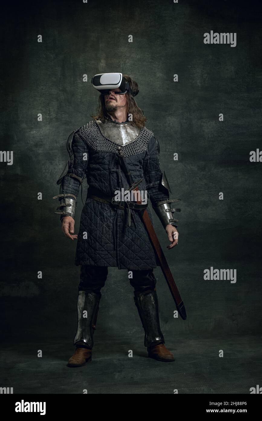 Portrait of man, medieval warrior, knight with dirty wounded face in VR ...