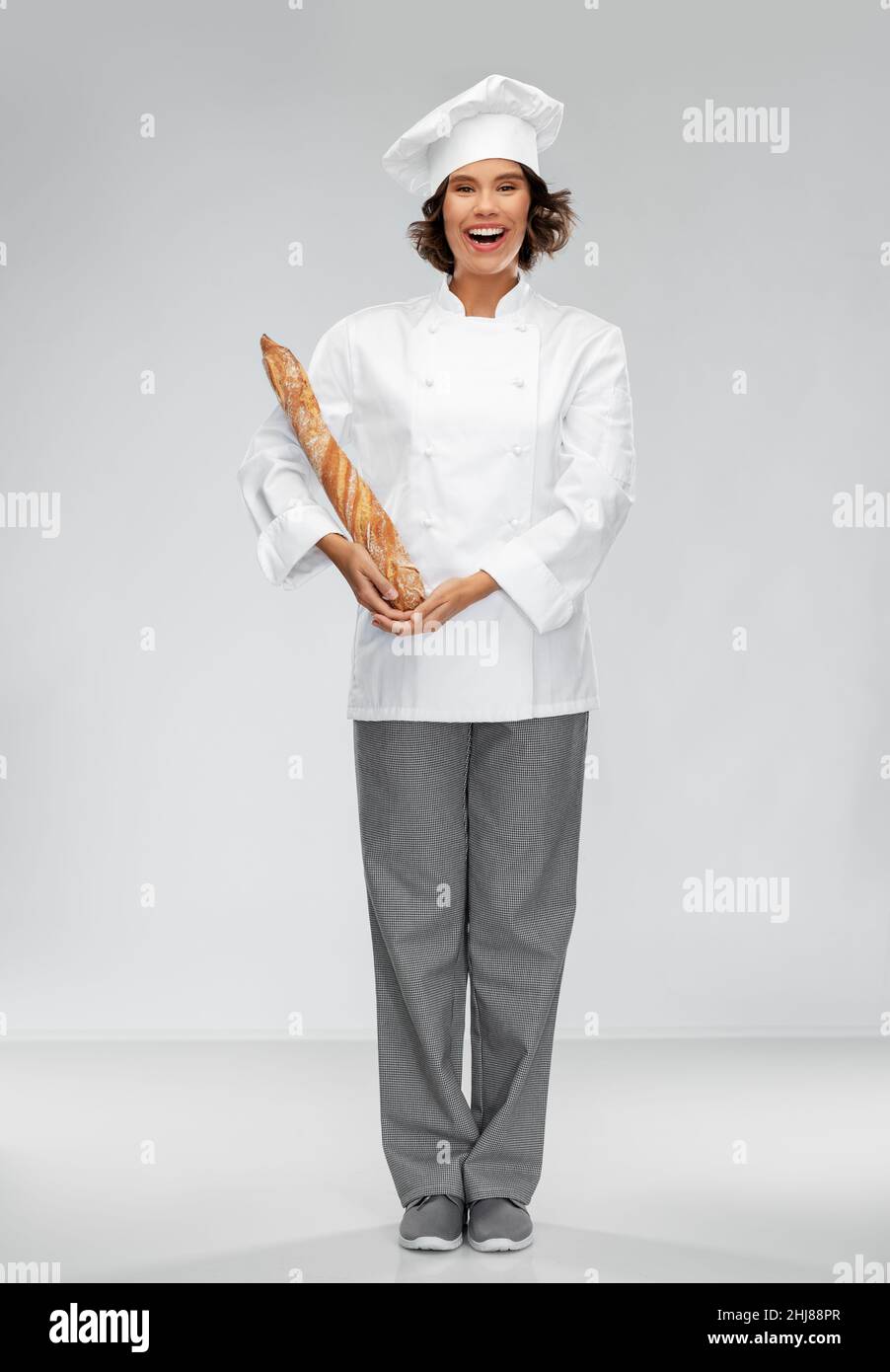 Laughing baker loaf bread hi-res stock photography and images - Alamy