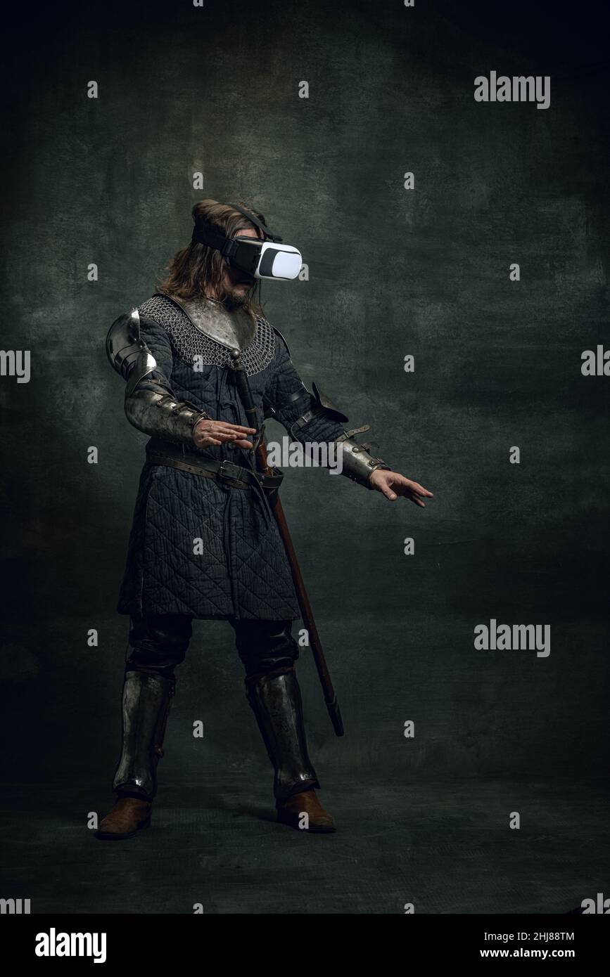 Portrait of man, medieval warrior, knight with dirty wounded face in VR ...