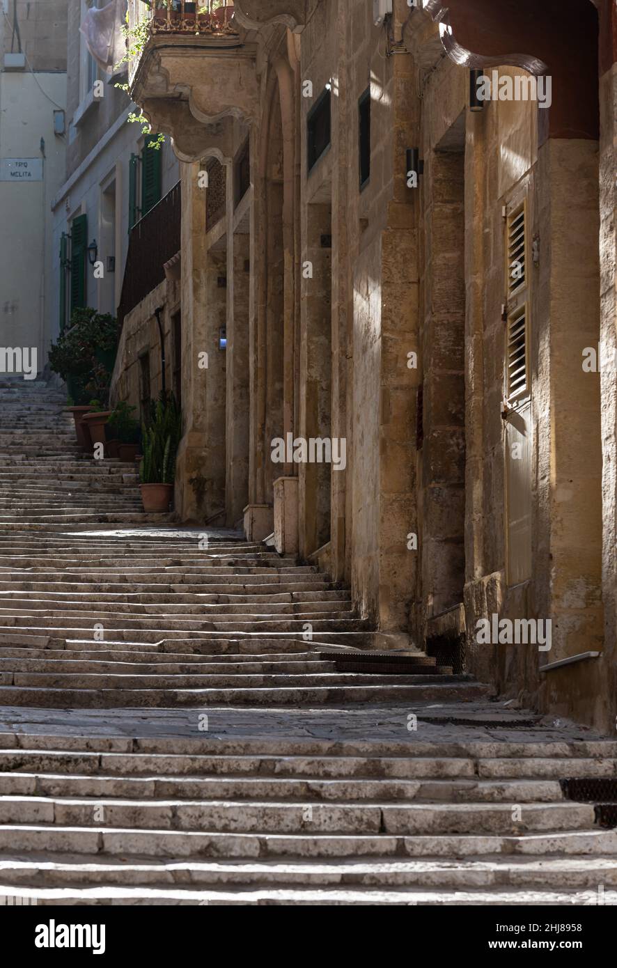 Brown stairsmade of traditional nature stone in Valletta Old Town ...