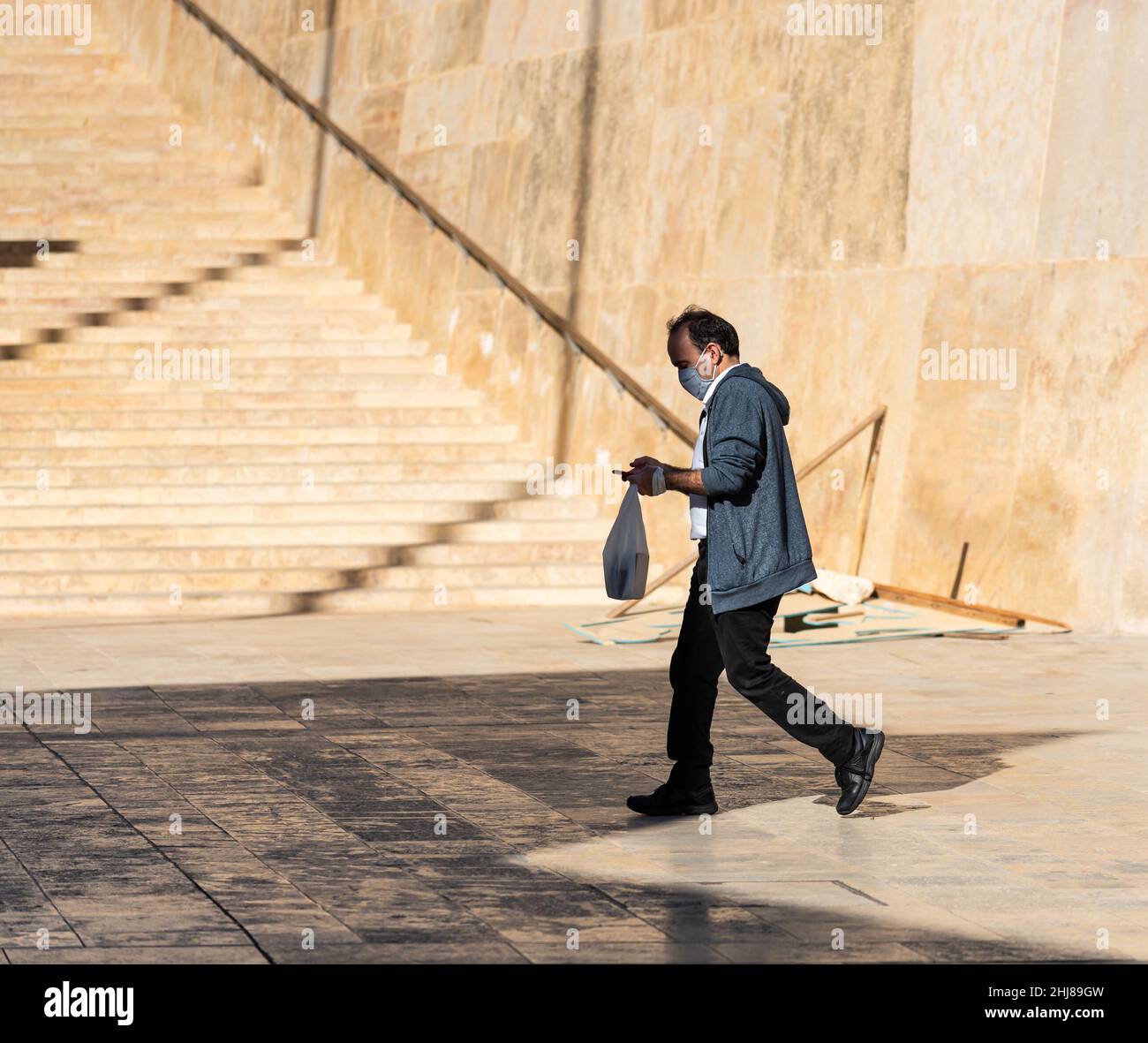 Valletta, Malta - 01 07 2022: Local man walking at the Freedom square ...