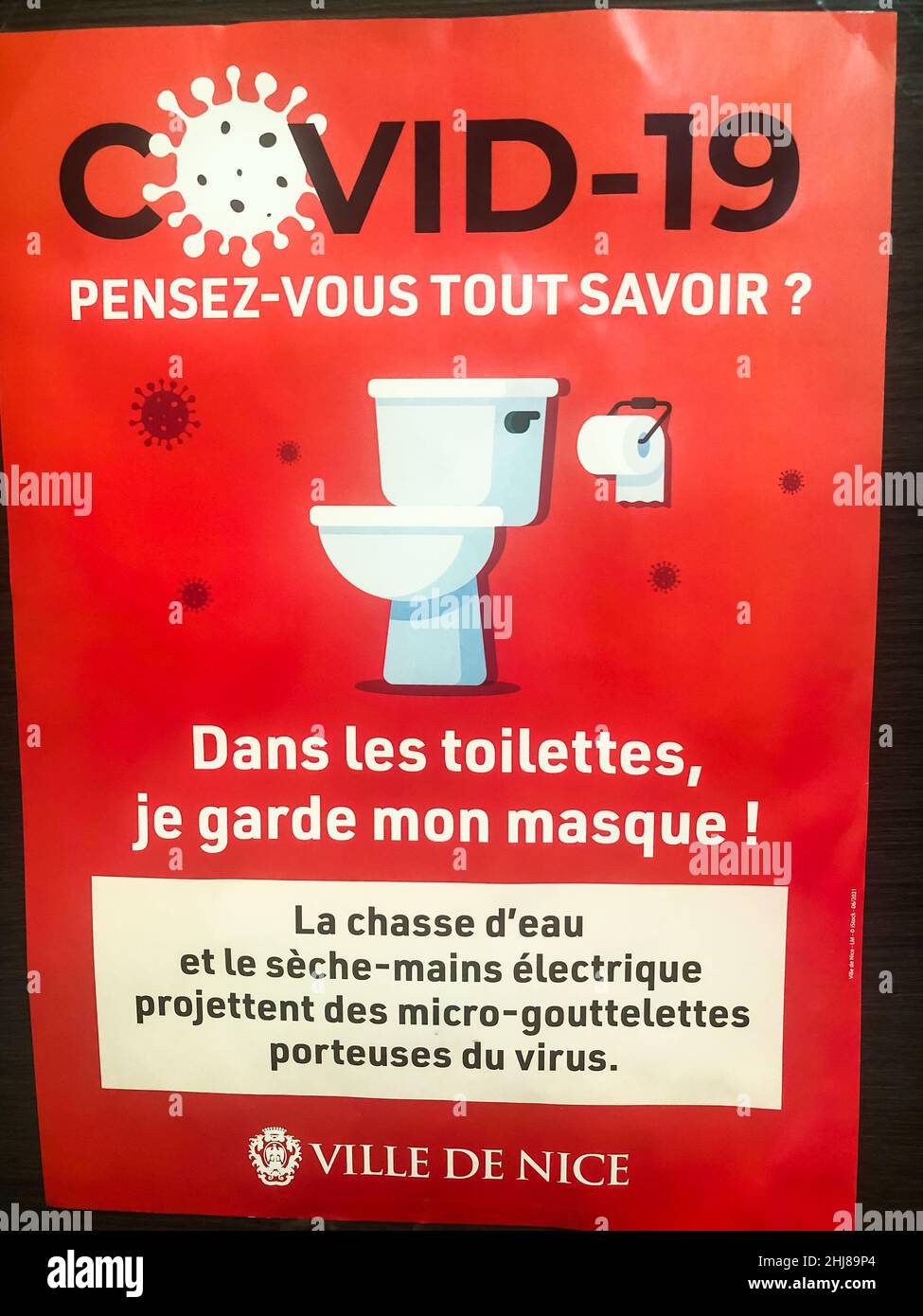 Nice, France, COVID-19 Mask Poster in Restaurant Bathroom Stock Photo ...