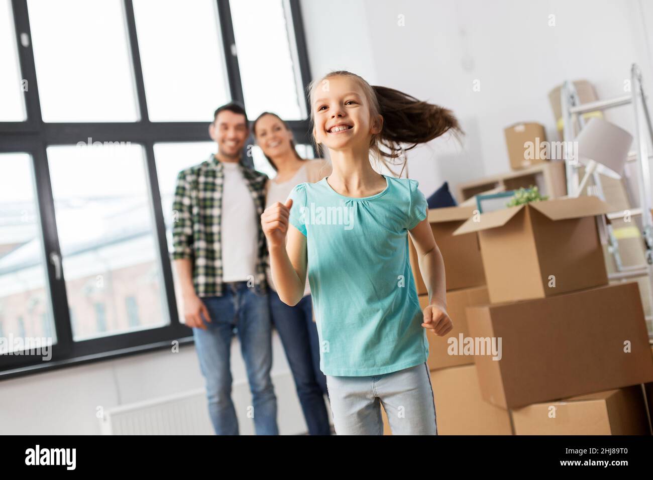 happy family with child moving to new home Stock Photo - Alamy