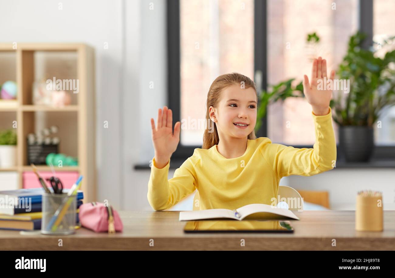 student girl touching something imaginary at home Stock Photo - Alamy