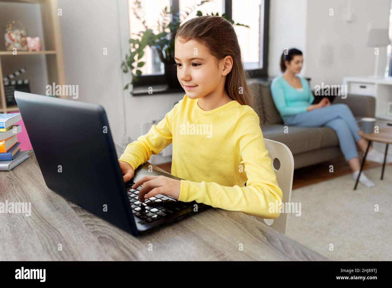 student girl with laptop learning online at home Stock Photo - Alamy