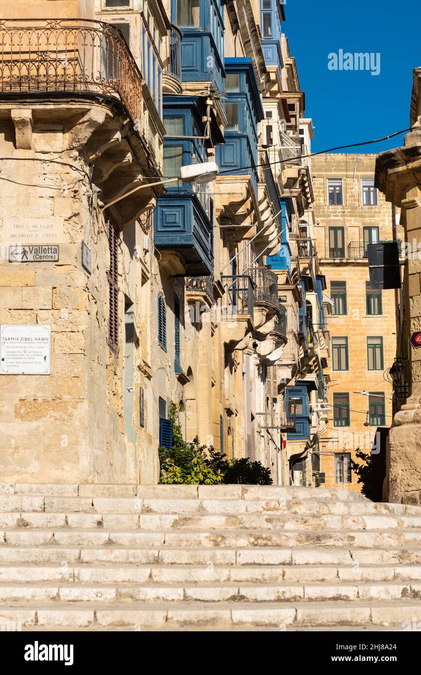 Valletta, Malta - 01 06 2022: Stairs and narrow traditional street with ...