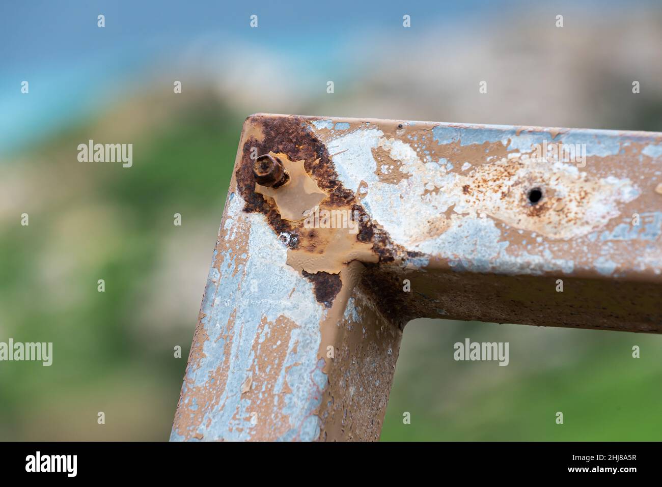 90 degrees angle of a worn rusted metal structure Stock Photo - Alamy