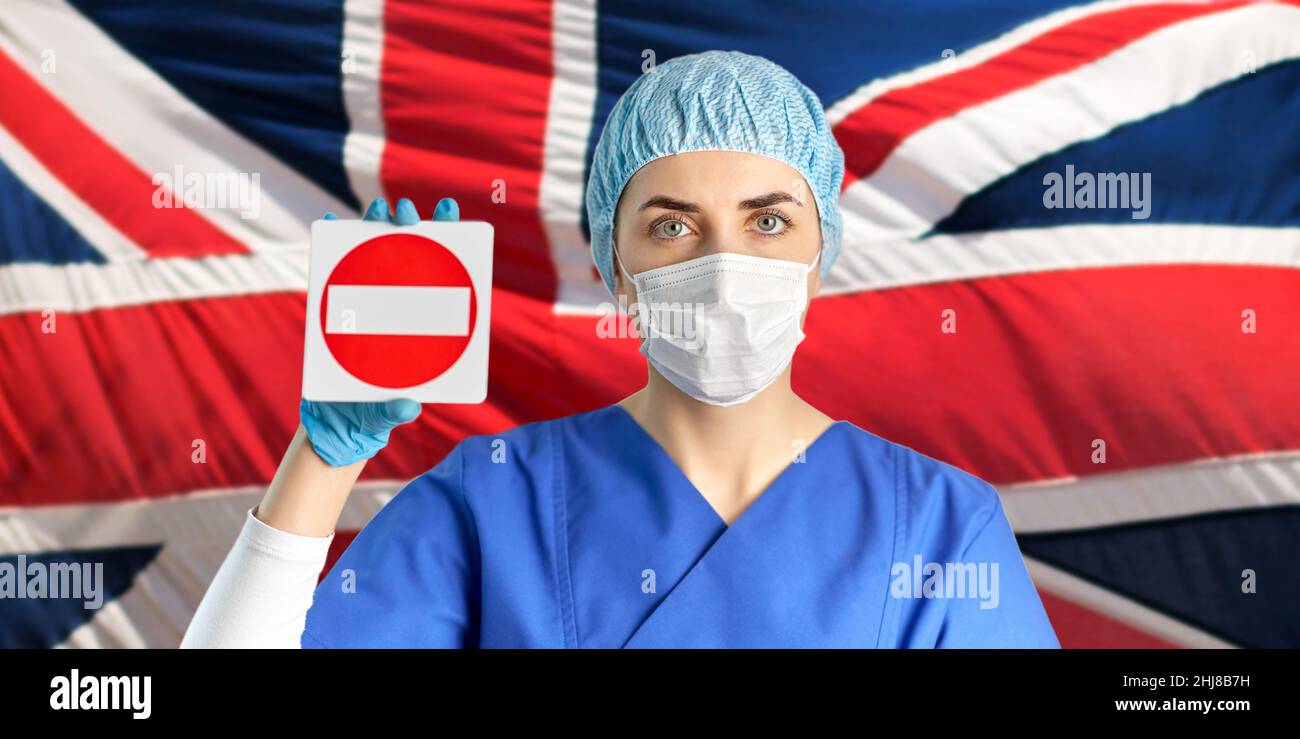 british doctor or nurse in mask showing stop sign Stock Photo - Alamy