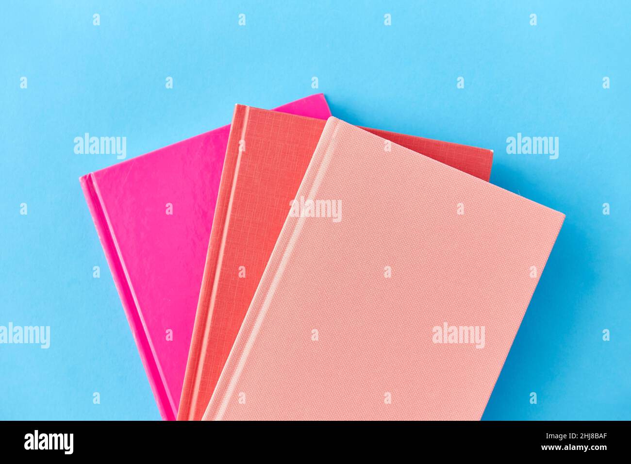 Pile of notebooks blue hi-res stock photography and images - Alamy