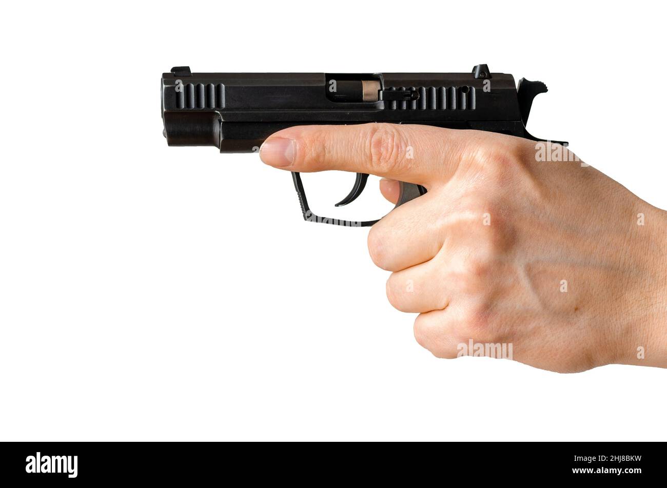 Man holding gun aiming pistol in hand ready to shoot. The criminal ...