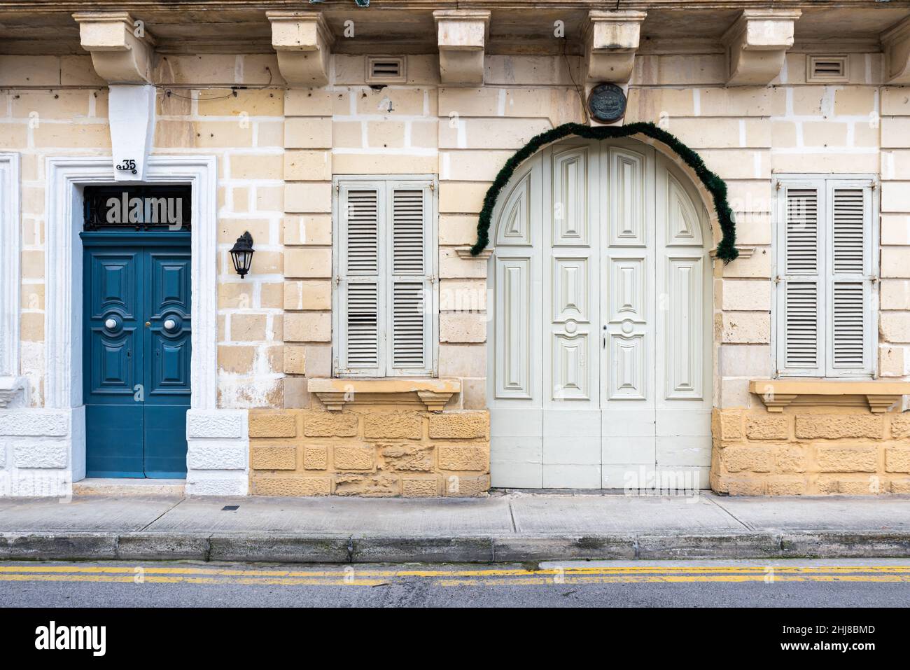 Marsakala, Malta - 01 07 2022: Traditional facade with wooden doors at ...
