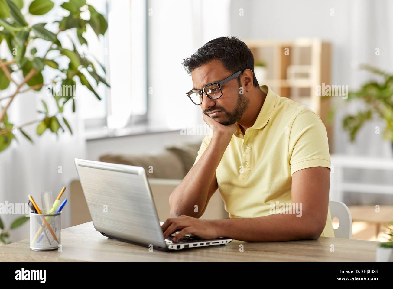 Man bored at home hi-res stock photography and images - Alamy