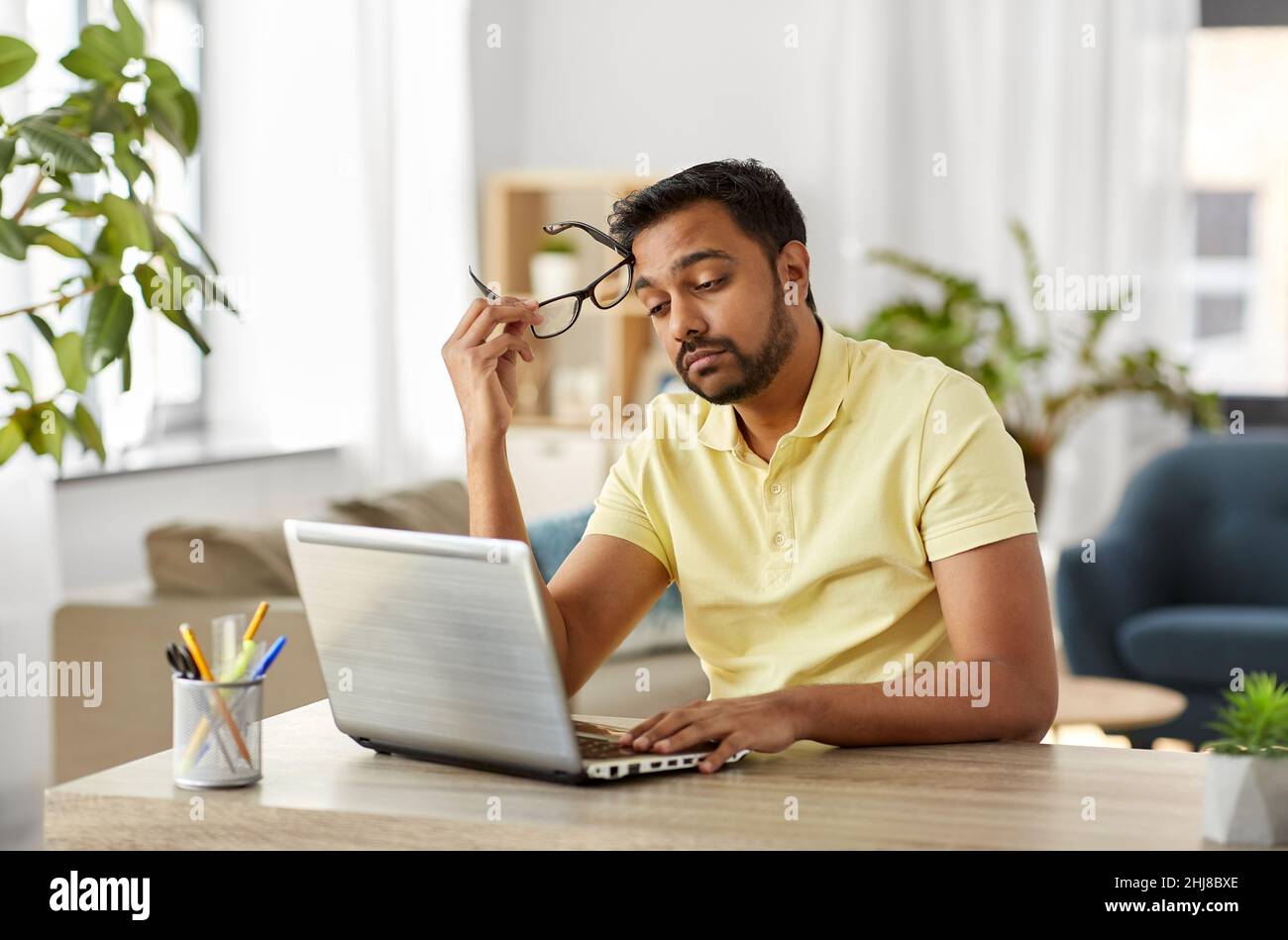 Man bored at home hi-res stock photography and images - Alamy