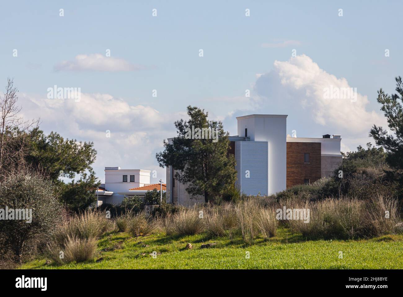 modern facade. View of the modern houseand trees in Turkey. Rich villa ...