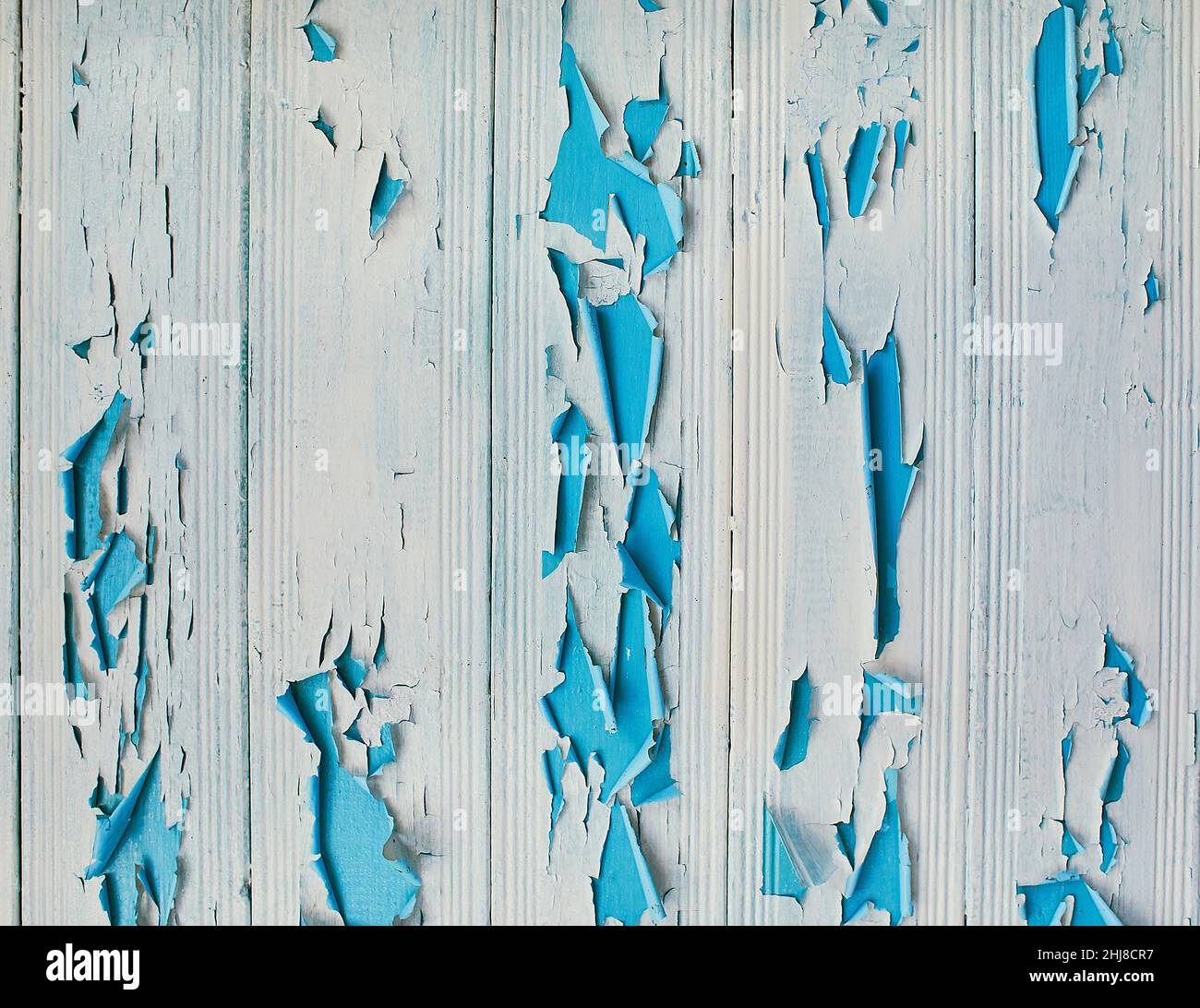 Old shabby wooden planks with cracked color paint, background. light ...