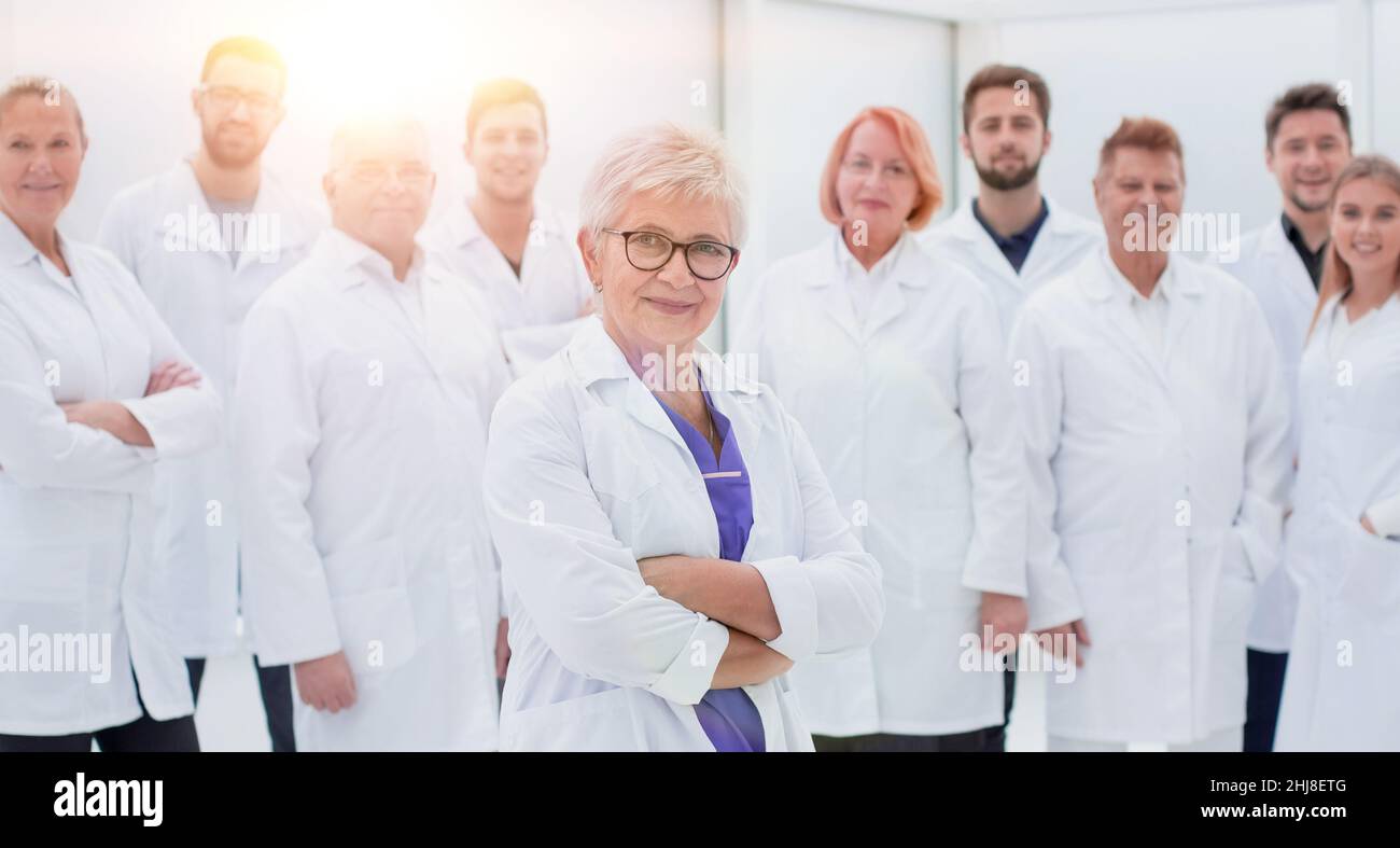 large group of people in white coats standing together Stock Photo - Alamy