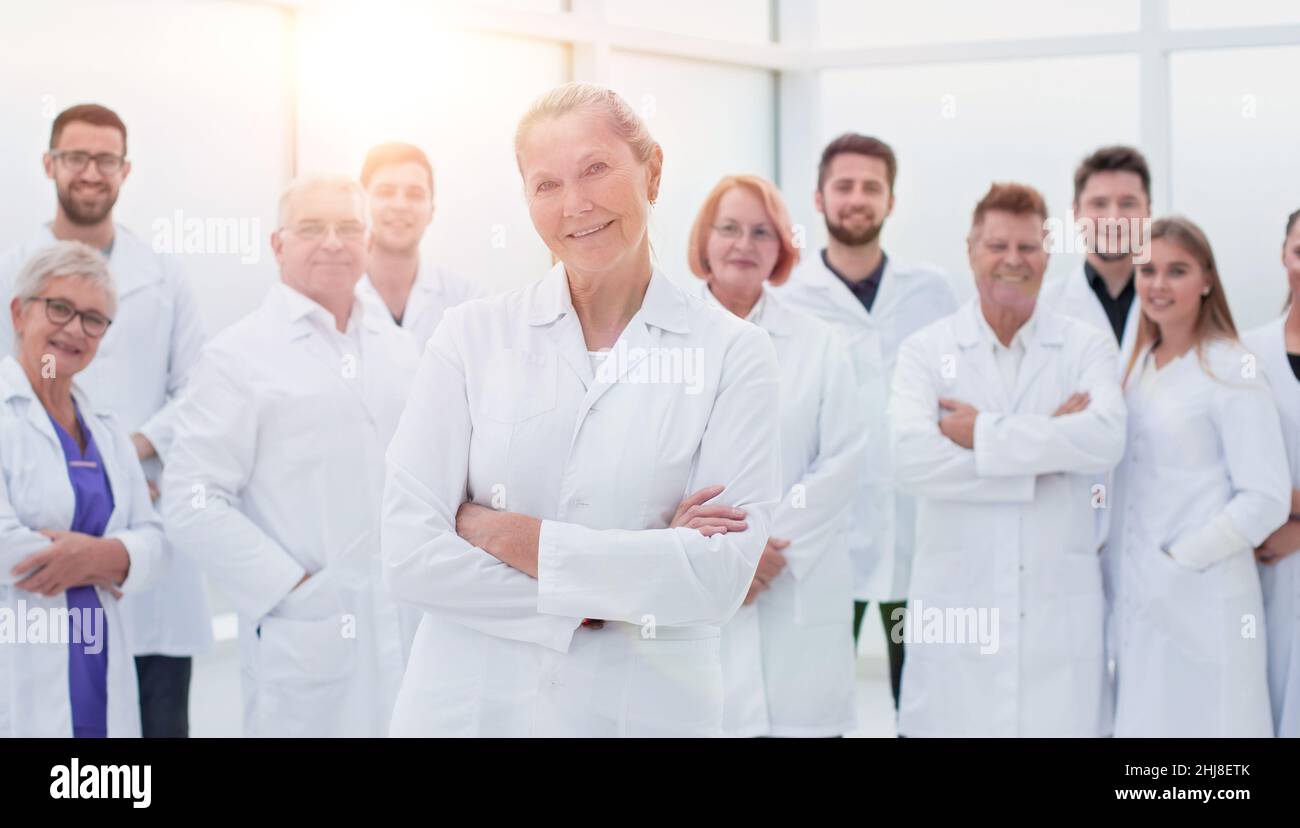 large group of people in white coats standing together Stock Photo - Alamy