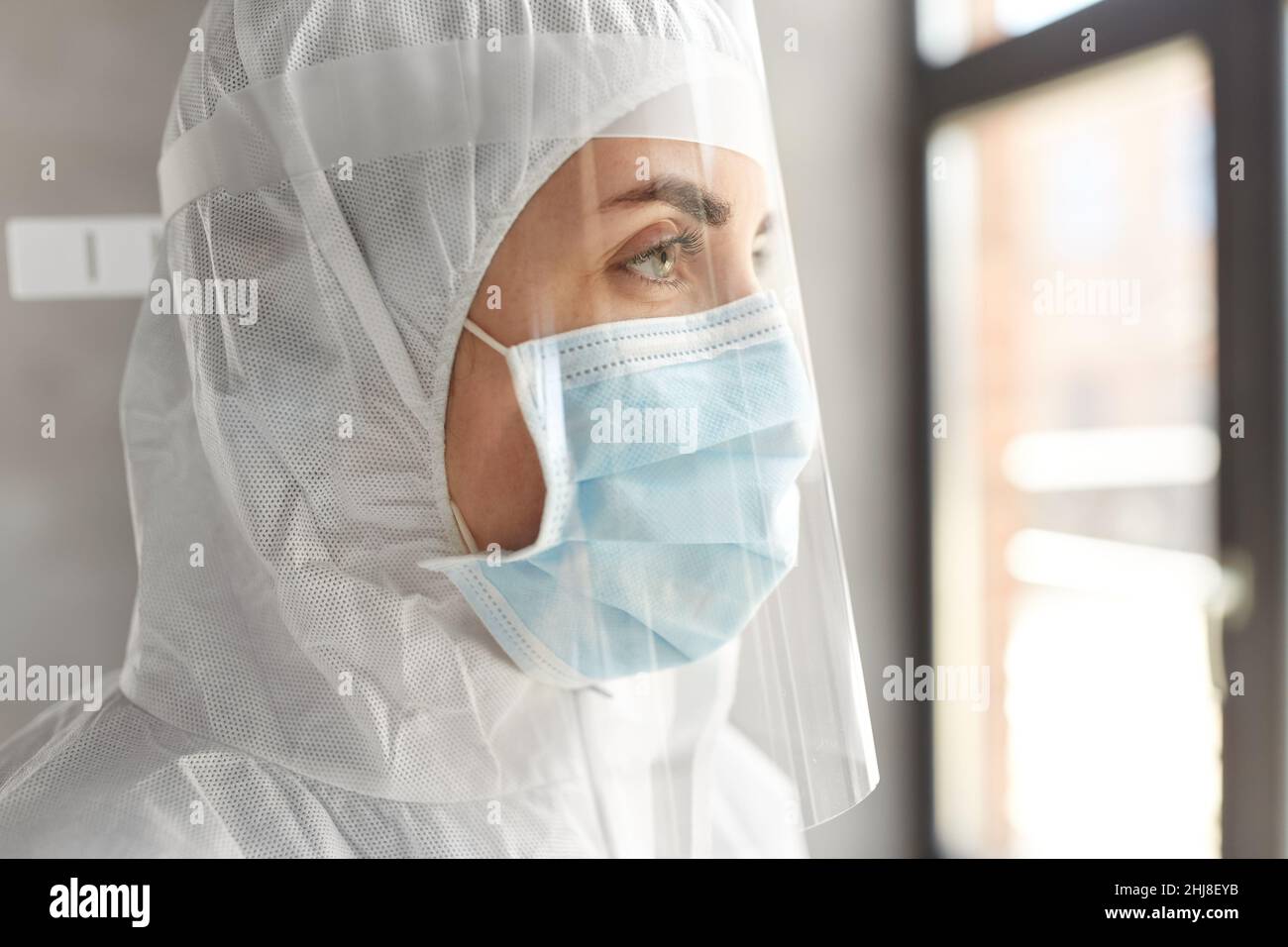 doctor in protective wear, mask and face shield Stock Photo - Alamy