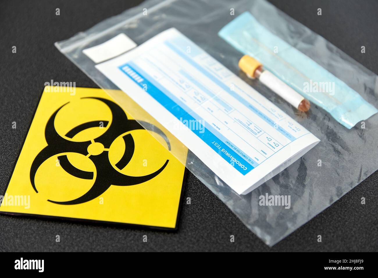 beaker with test, cotton swab and medical report Stock Photo - Alamy