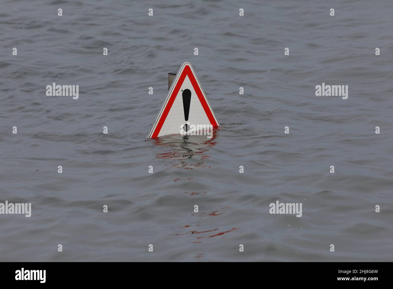 Closeup of a sign in the water on a gloomy weather Stock Photo - Alamy