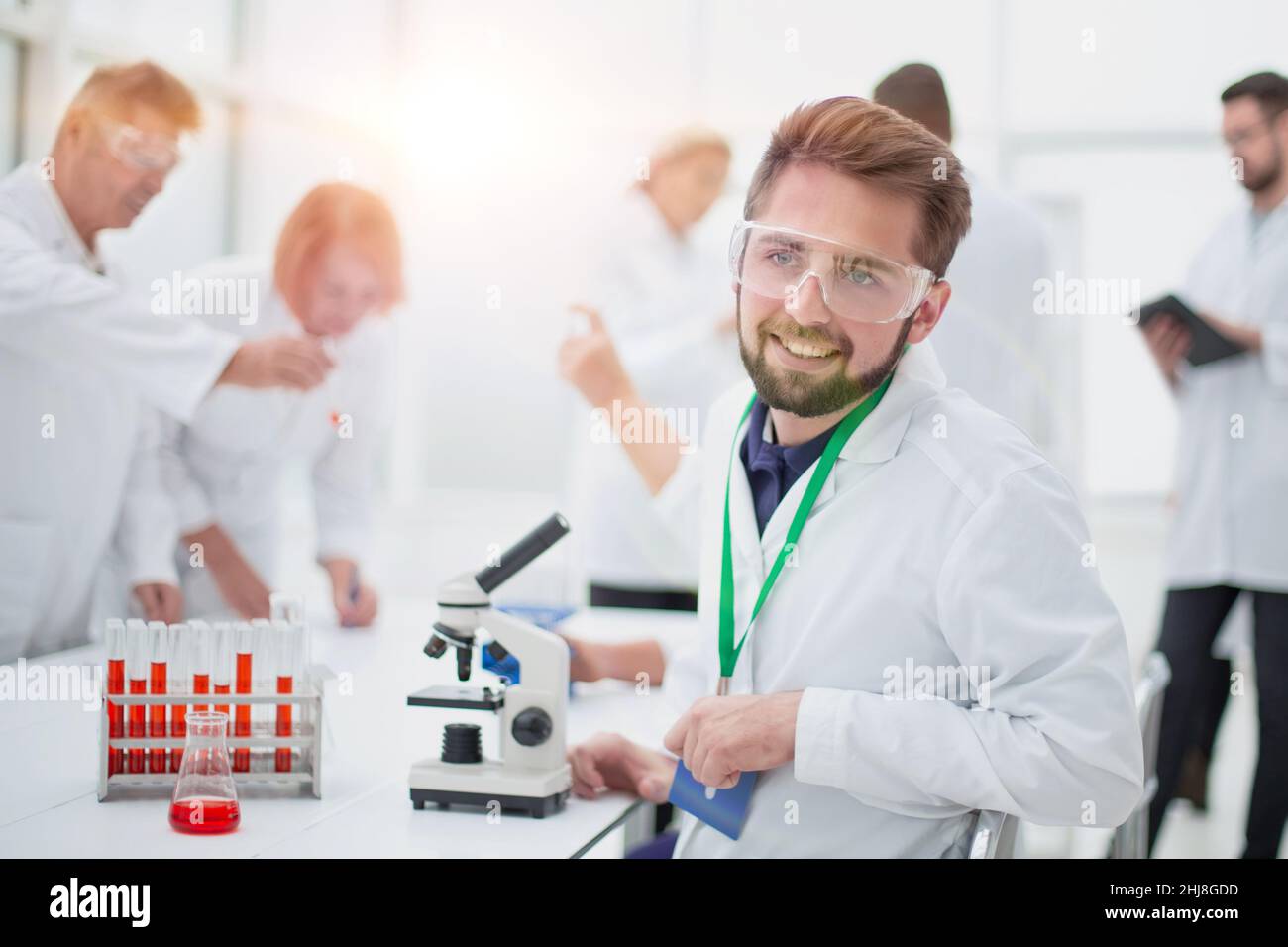 young scientist is working with a microscope in the laboratory Stock ...