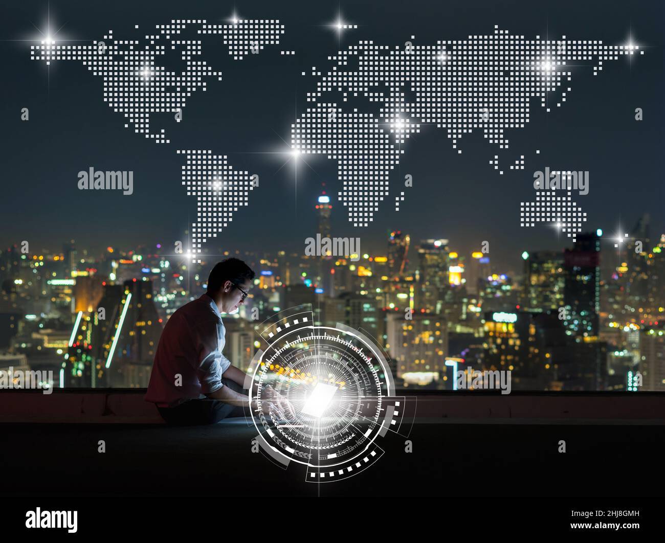 Asian businessman sitting and using the laptop with Network graphic ...