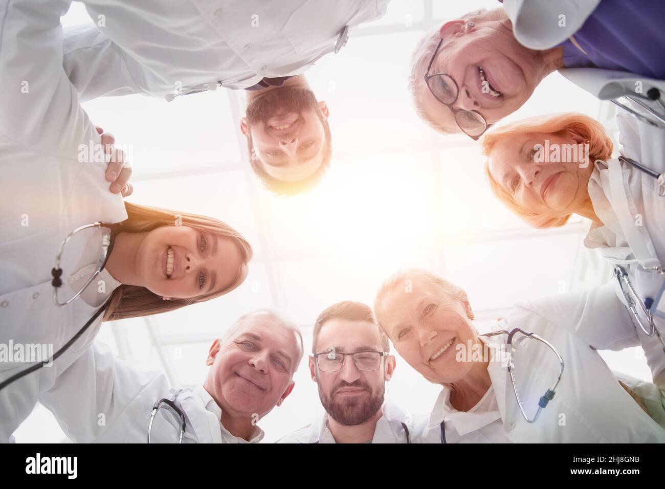 close up. group of scientists and doctors standing in a circle Stock ...
