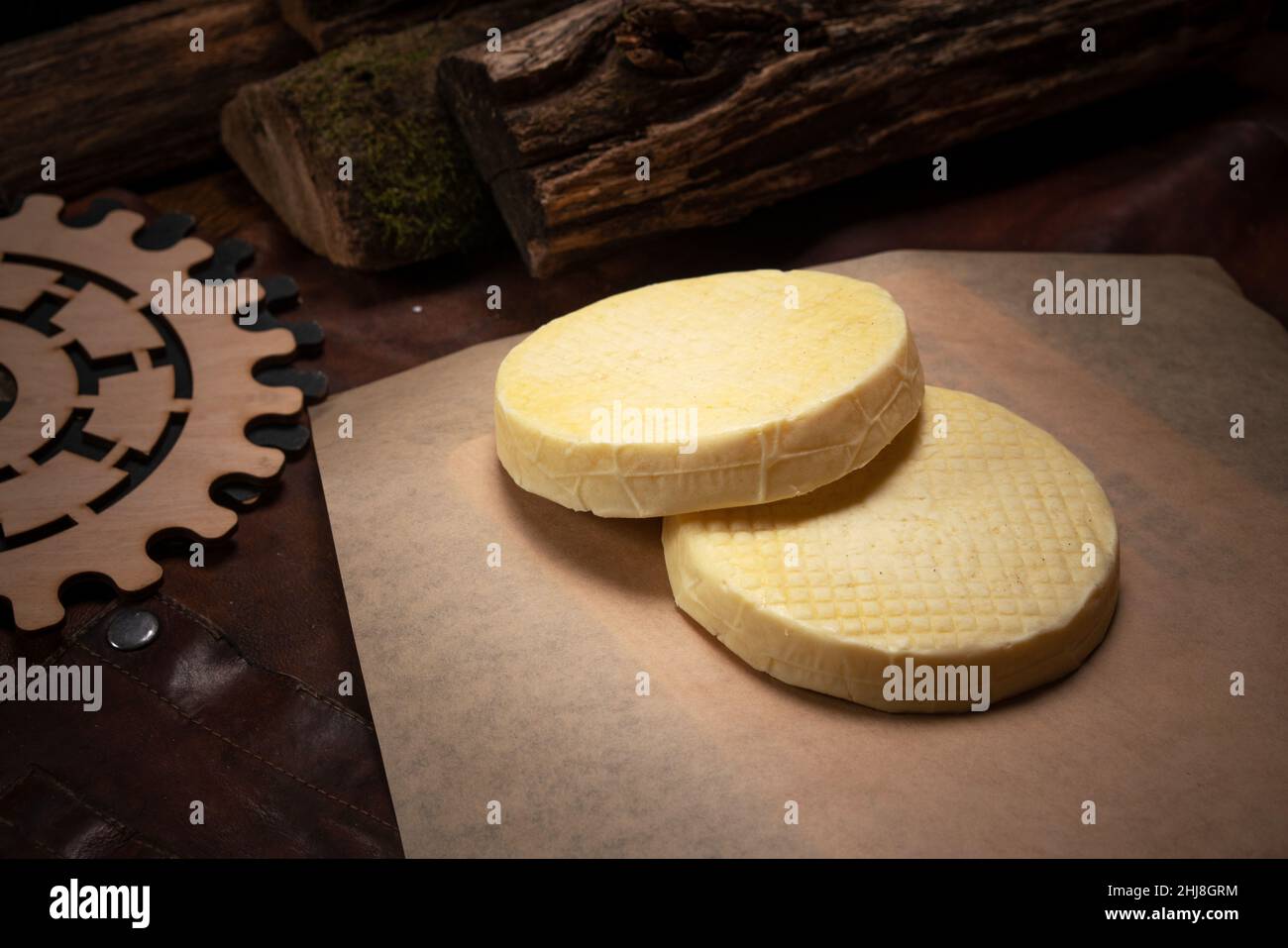 Cheddar cheese wheels in cellar hi-res stock photography and images - Alamy