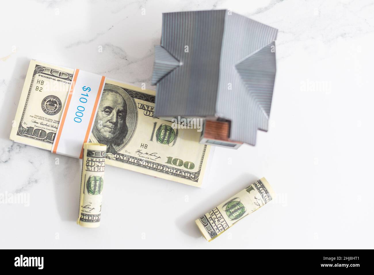 Stack of dollars as a Foundation to a house Stock Photo - Alamy