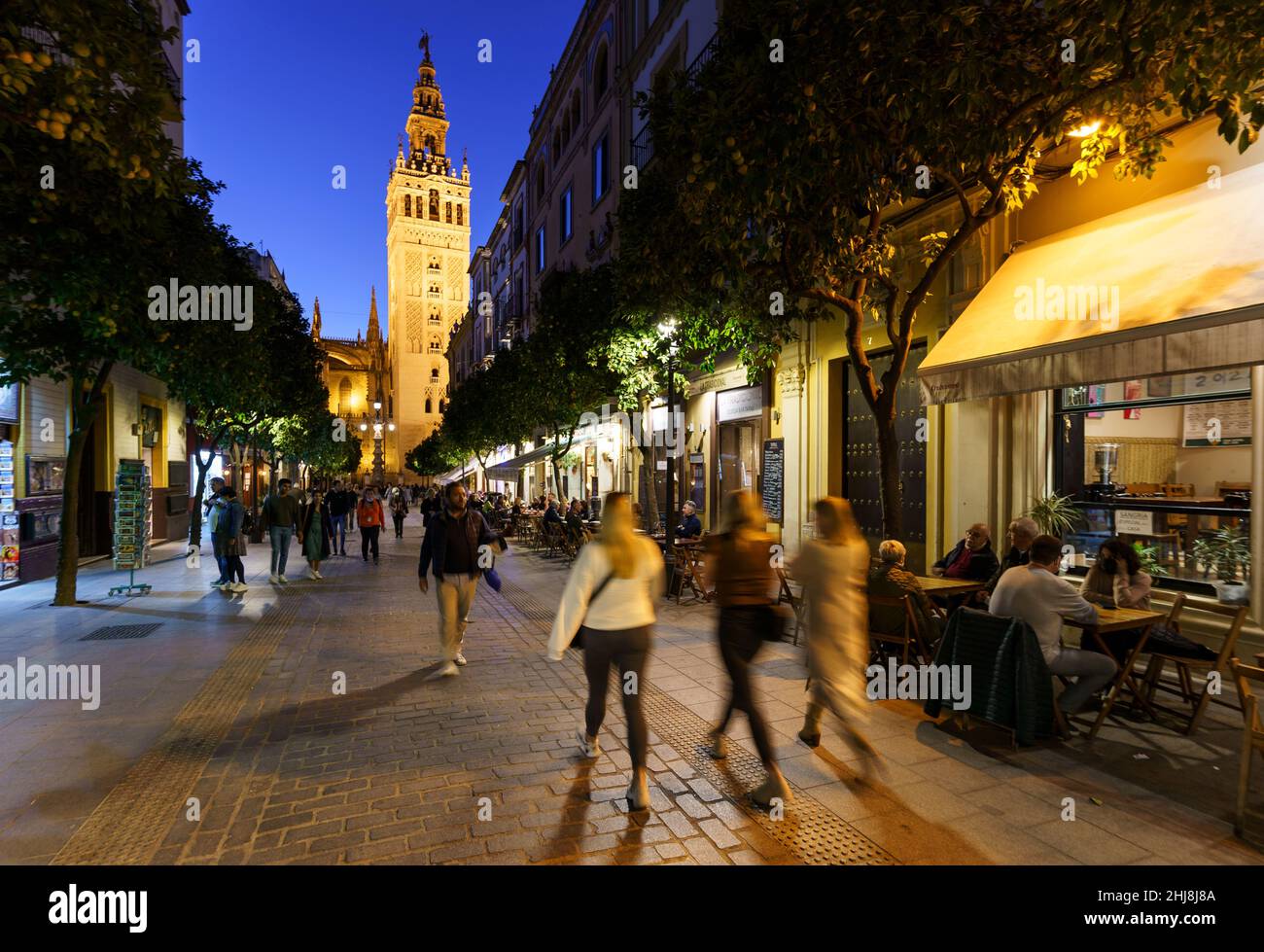 Seville, Spain - November 08 2021: Tourists and local people walk the ...