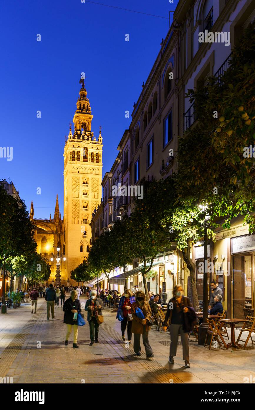 Seville, Spain - November 08 2021: Tourists and local people walk the ...