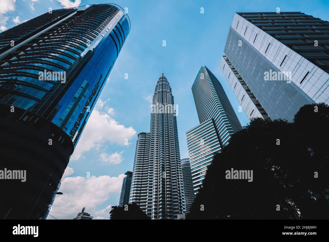 High modern skyscrapers in city in daytime Stock Photo - Alamy