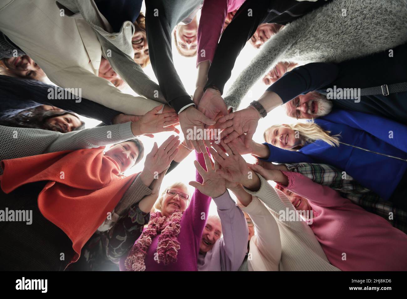 Stacking arms hi-res stock photography and images - Alamy