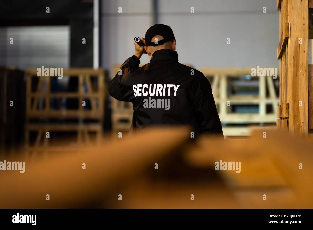 Security Guard Walking Building Perimeter With Flashlight At Night ...