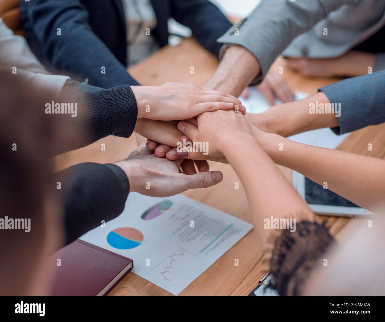 close up. business team showing their unity Stock Photo - Alamy