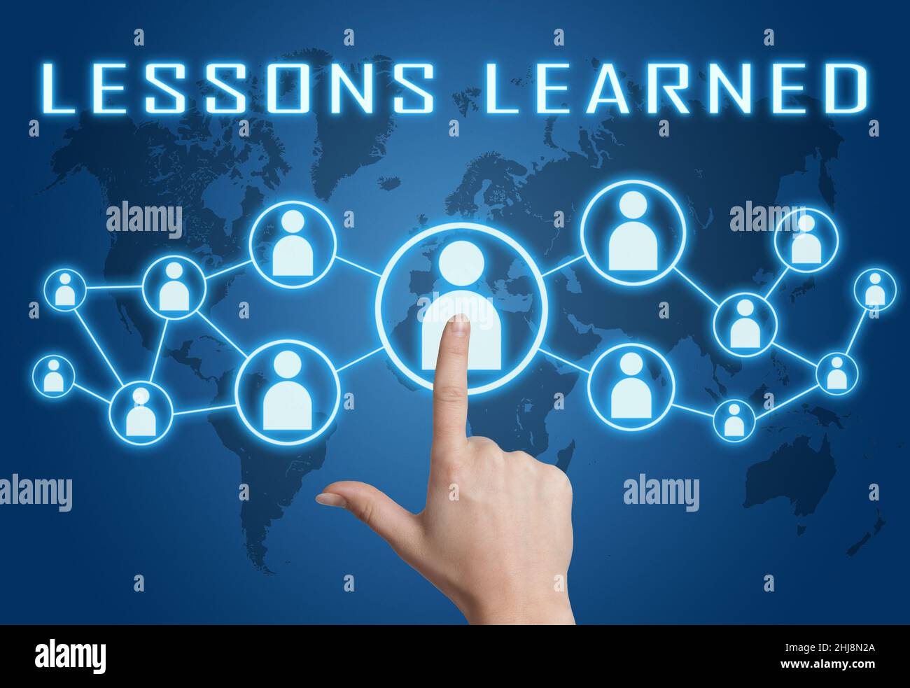 Lessons learned - text concept with hand pressing social icons on blue ...