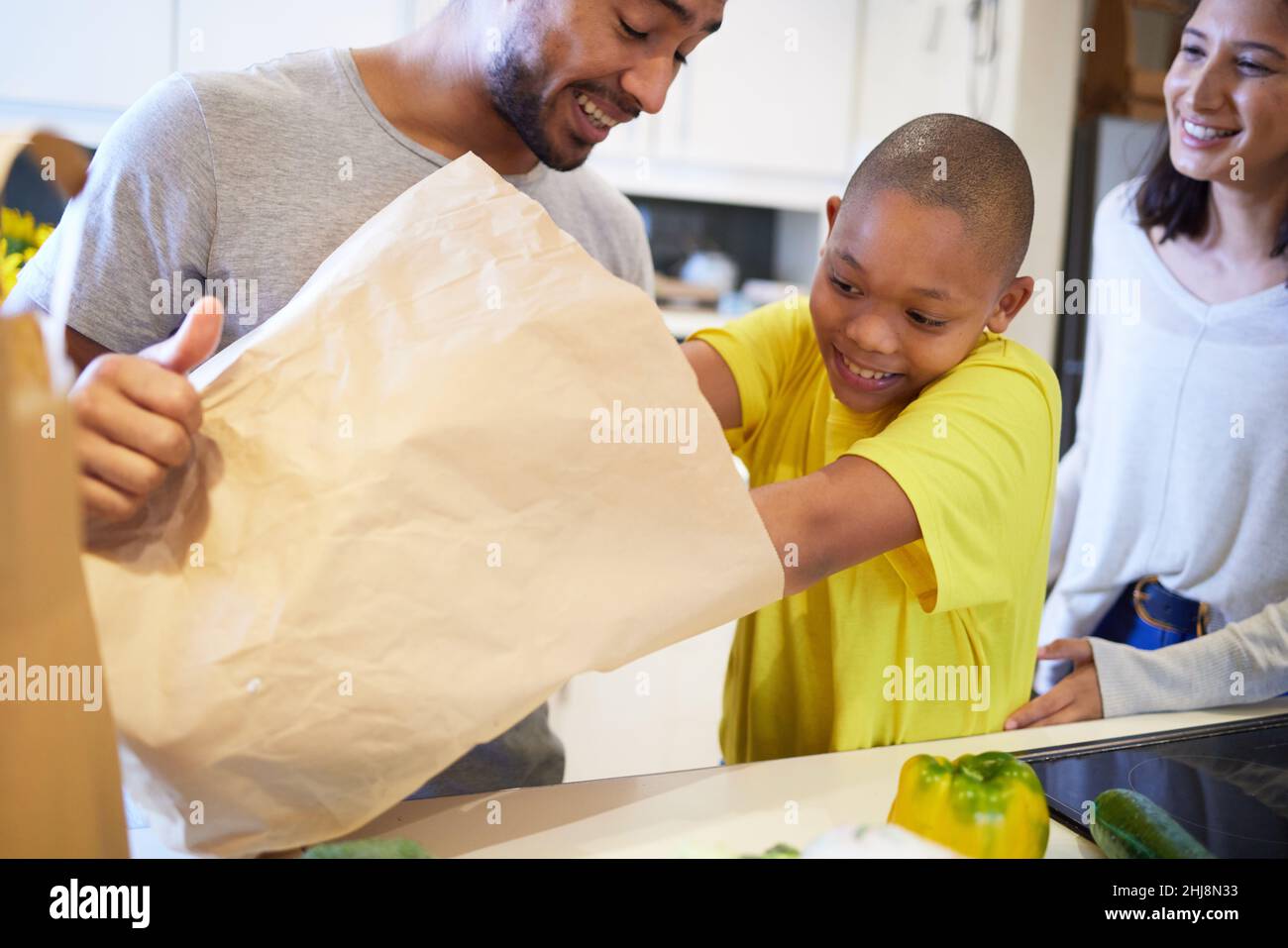 Person holding snack bag hi-res stock photography and images - Alamy