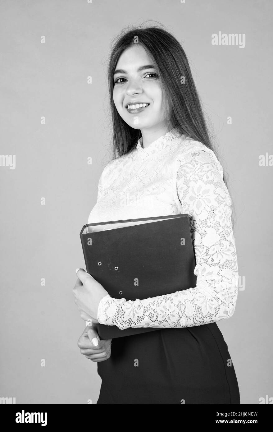 happy teen girl hold paper document folder, back to school Stock Photo ...