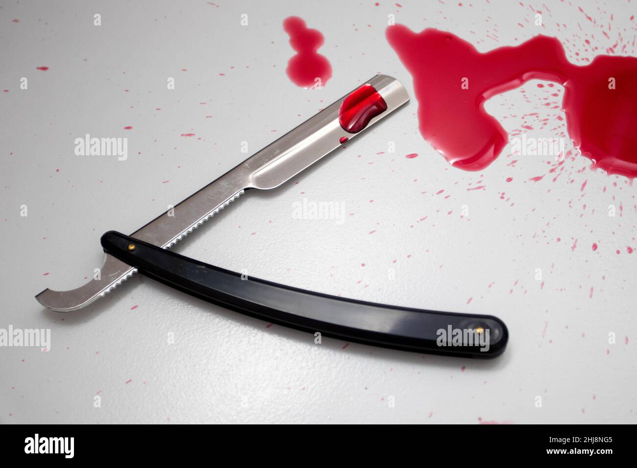 straight razor and Drops of blood Stock Photo - Alamy