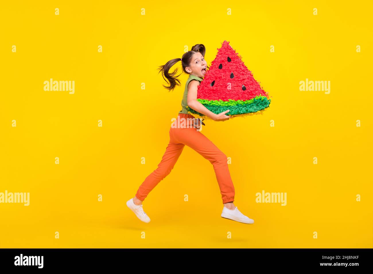 Photo of charming sweet preteen girl dressed green top jumping high ...