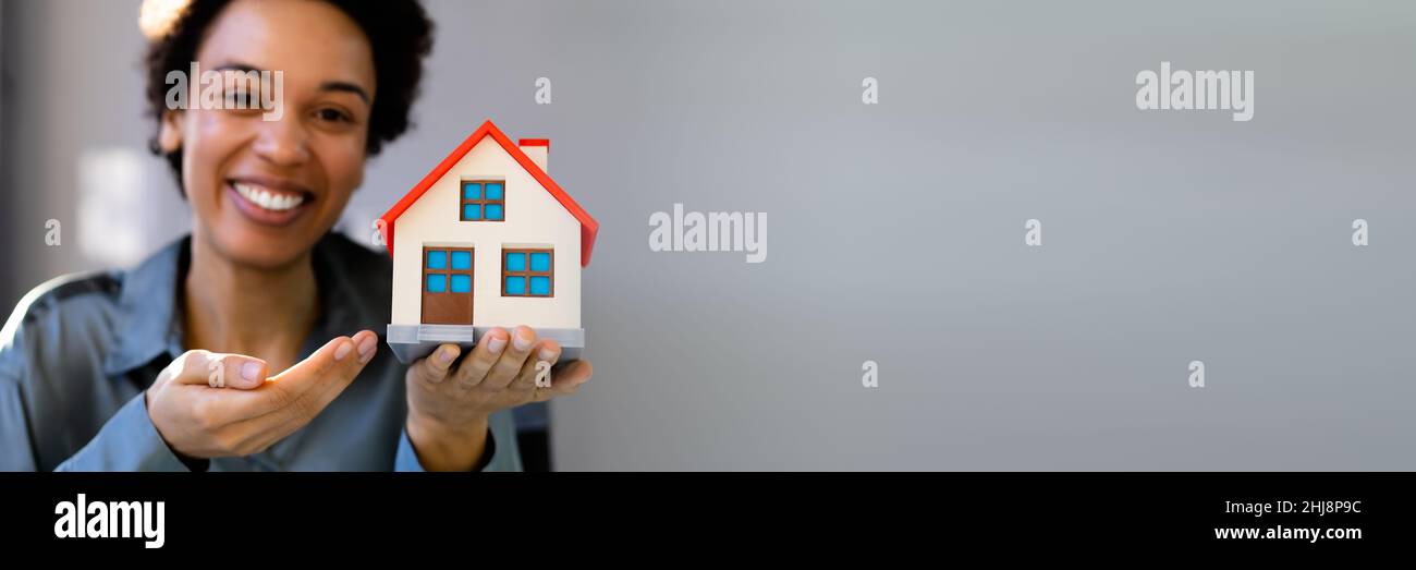 African American House Mortgage Insurance And Cover Stock Photo - Alamy