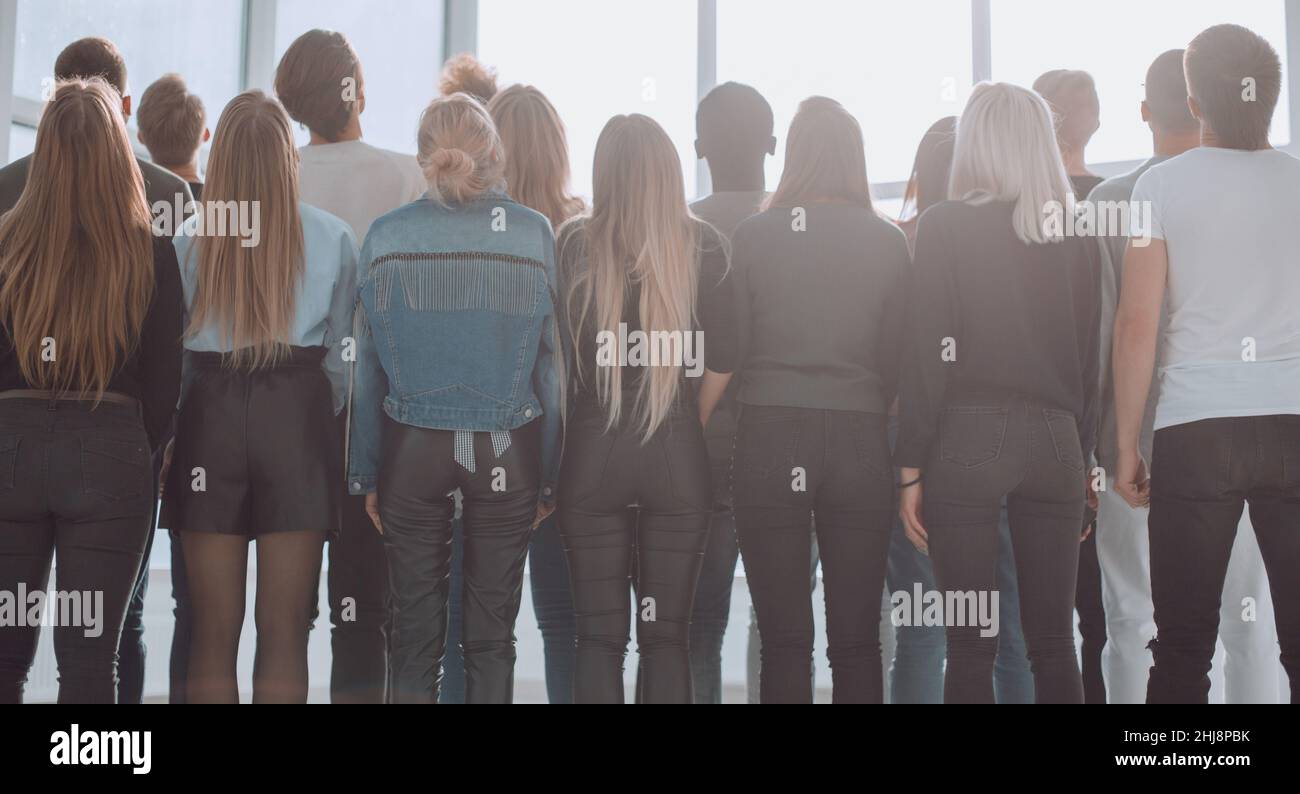 group of casual young people looking forward Stock Photo - Alamy