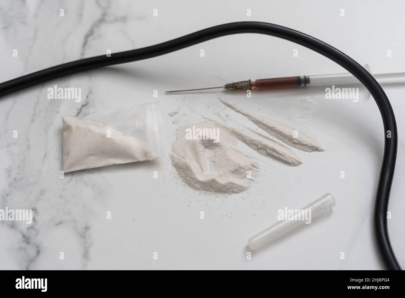 Drugs of various kinds and human skulls on the floor, Collection of ...